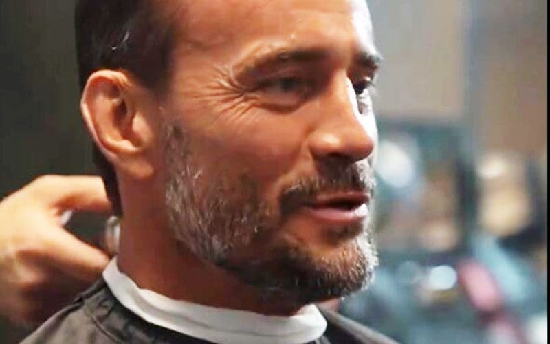 CM Punk Receives Haircut Backstage at 2024 WWE Royal Rumble Event
