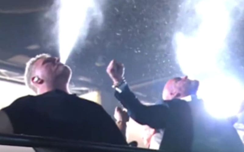 Triple H & Pat McAfee Do Iconic Water Spit at WWE World